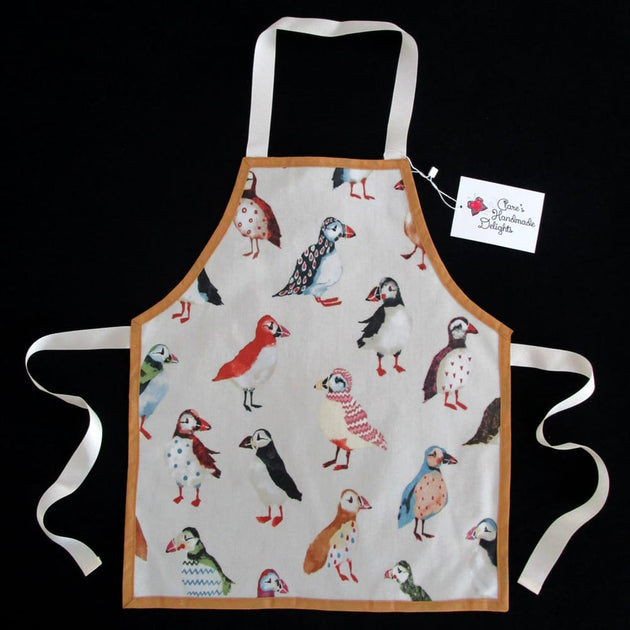 PVC apron – puffins/mustard (small/3-7 years size) | Sunshine No.1